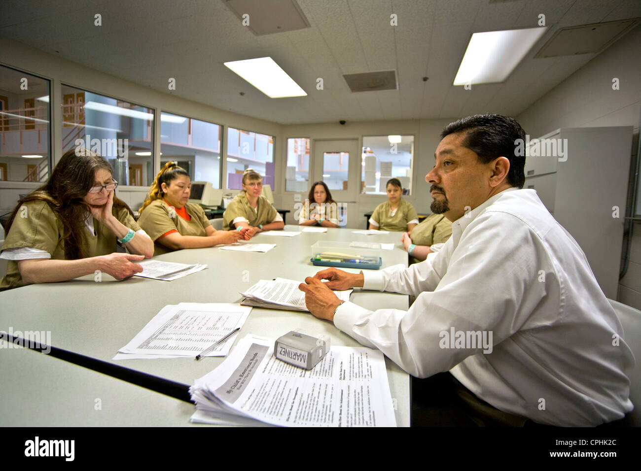 Uniformed women jail inmates participate in a drug treatment seminar ...