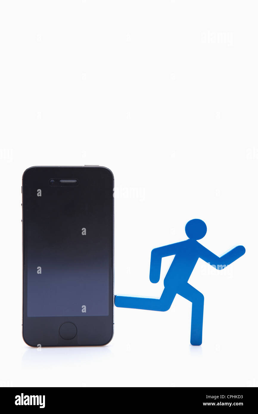 Smarphone and running blue figure Stock Photo - Alamy