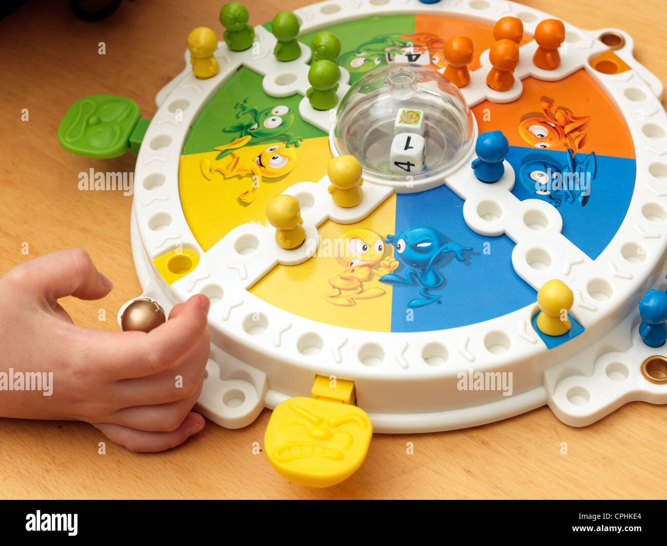 Frustration Game With Counters And Dice Stock Photo - Alamy