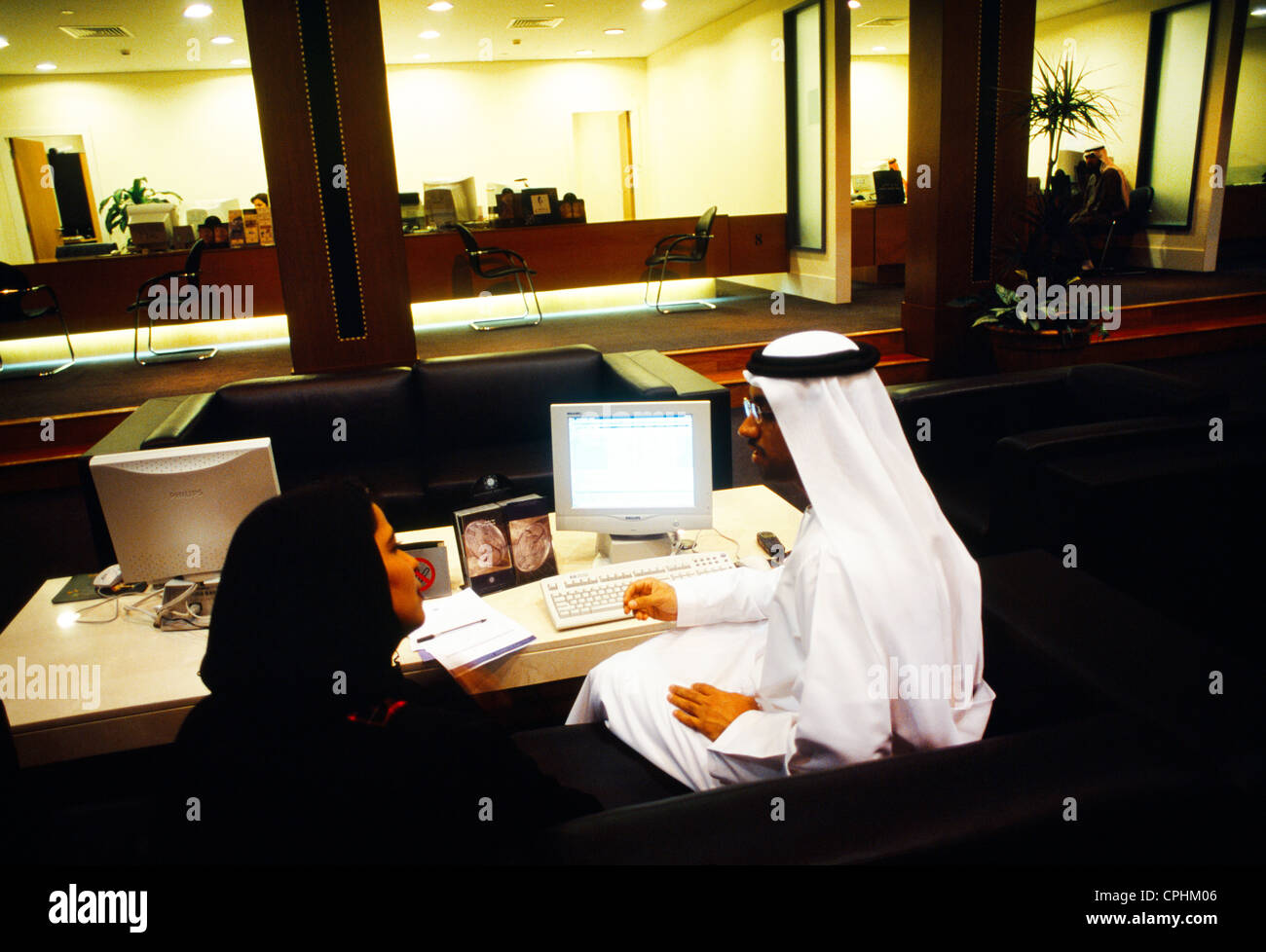 Dubai Uae Financial Market Man and Woman On Computer Stock Photo - Alamy