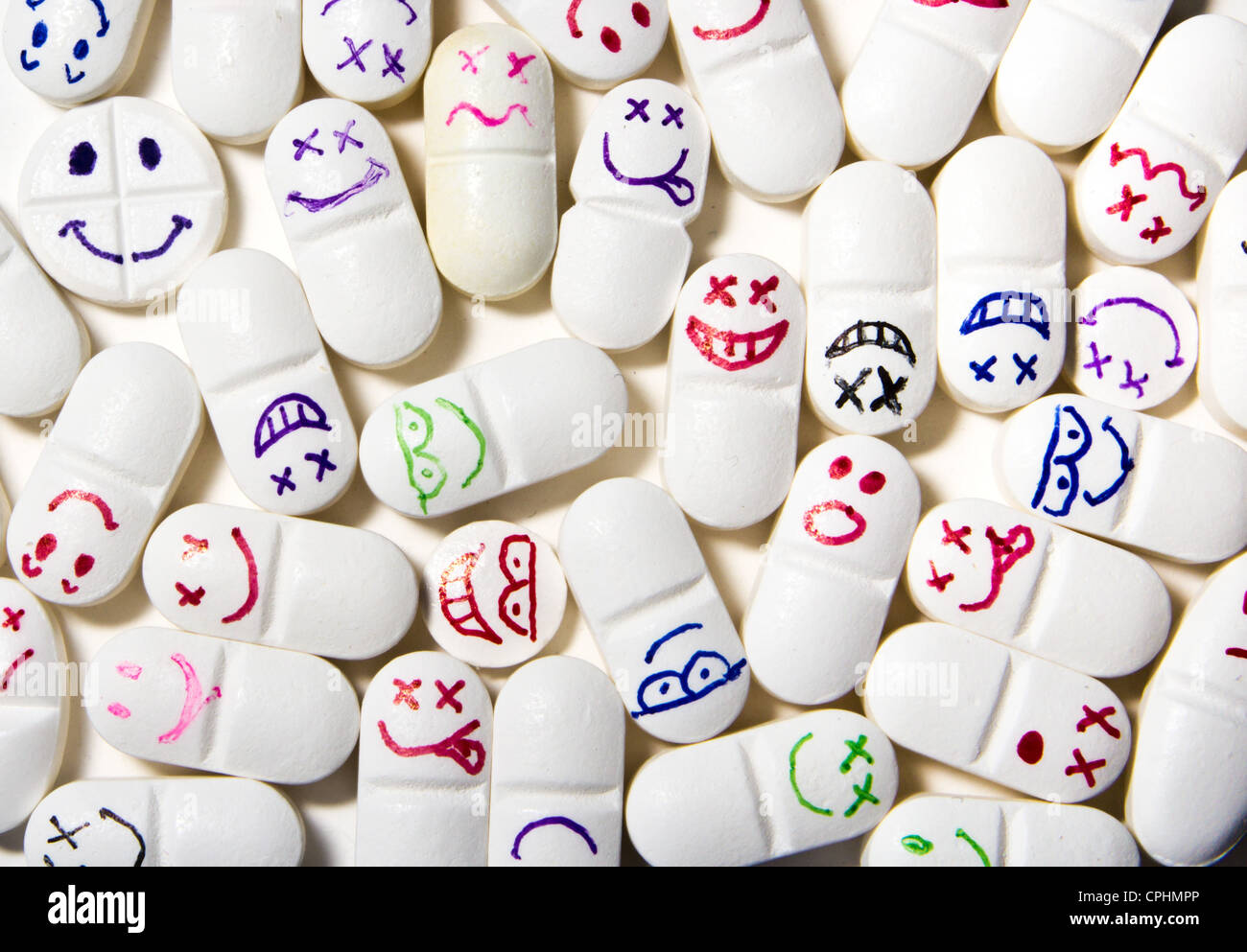smiley face pills Stock Photo - Alamy