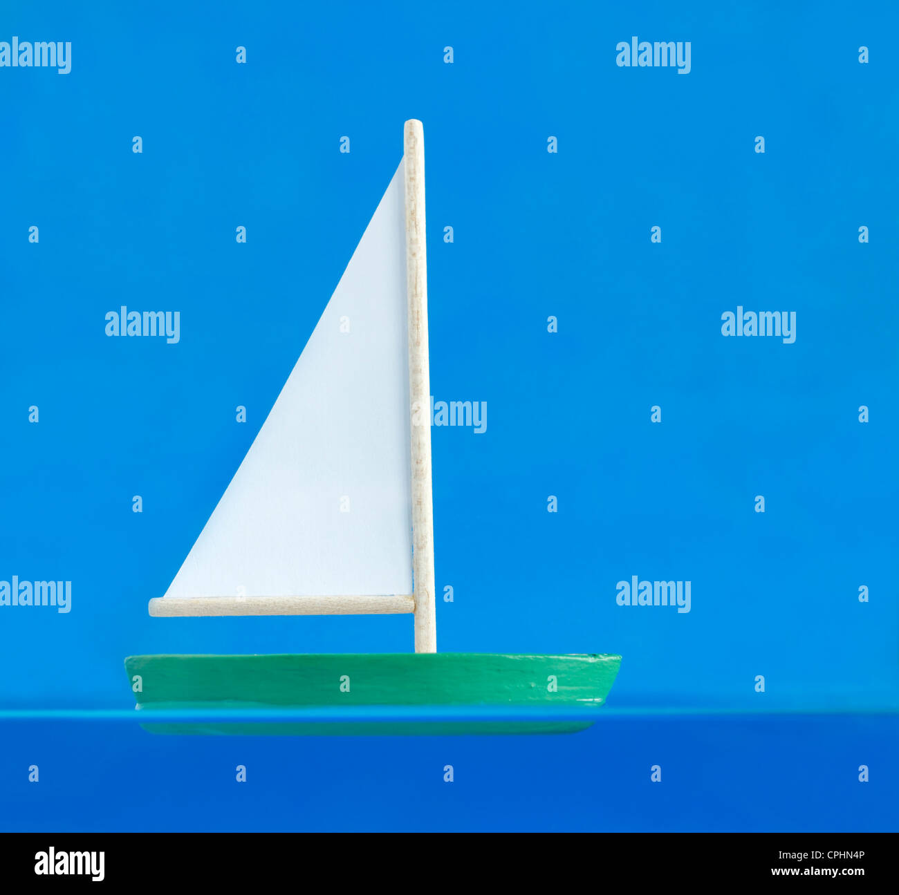 Model boat in water Stock Photo - Alamy