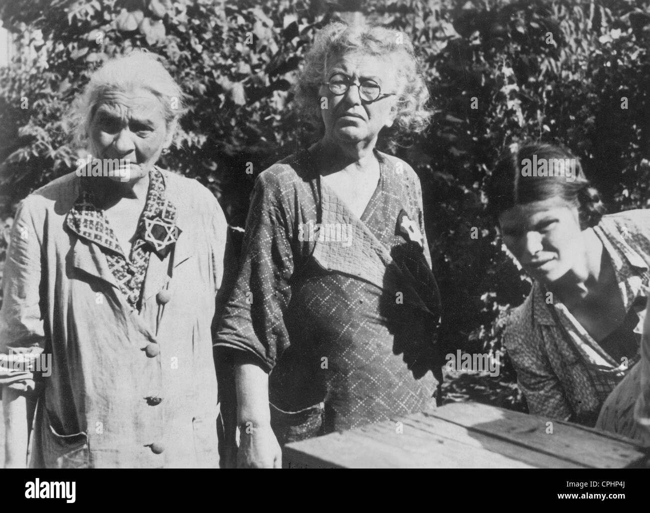 Three Jewish women in the ghetto at Chisinau, Moldova, August 1941 (b/w ...