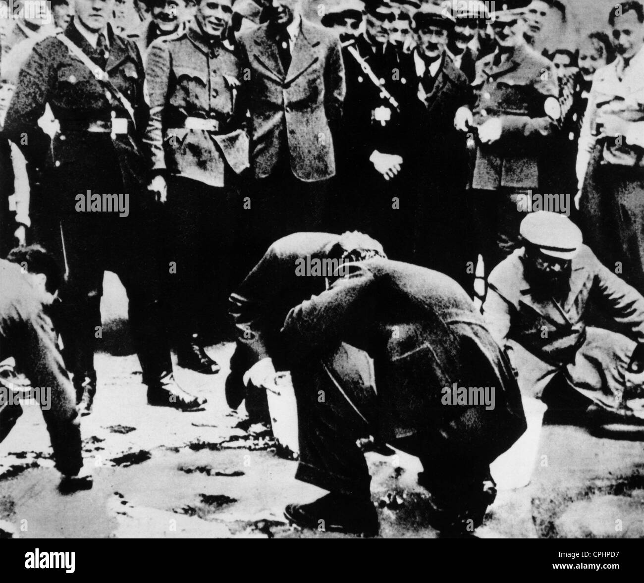 Viennese Jews forced to scrub the city streets following the Nazi ...