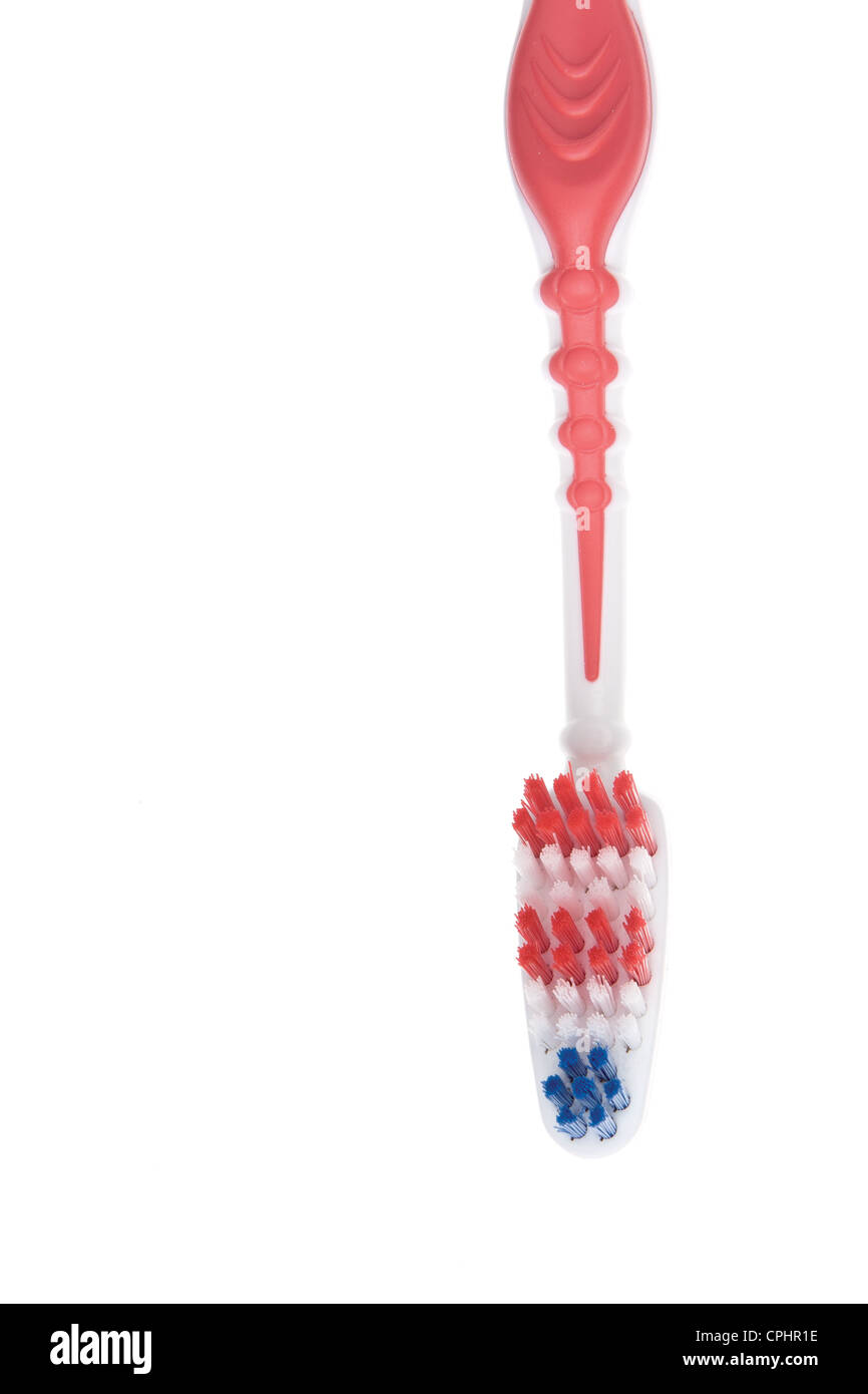 Toothbrush, red. With white background Stock Photo - Alamy