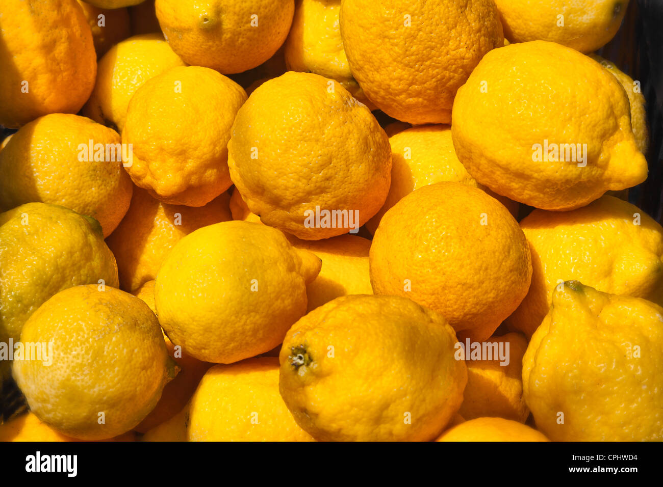 Fresh lemons in a stack Stock Photo - Alamy