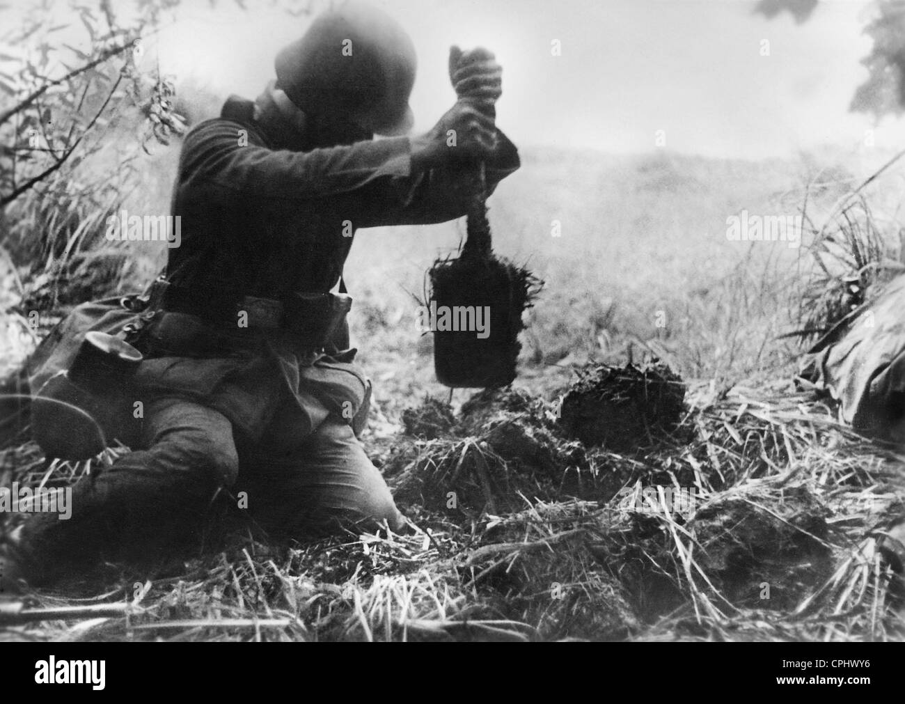 German Soldier is Digging a Foxhole, 1942 Stock Photo, Royalty Free ...