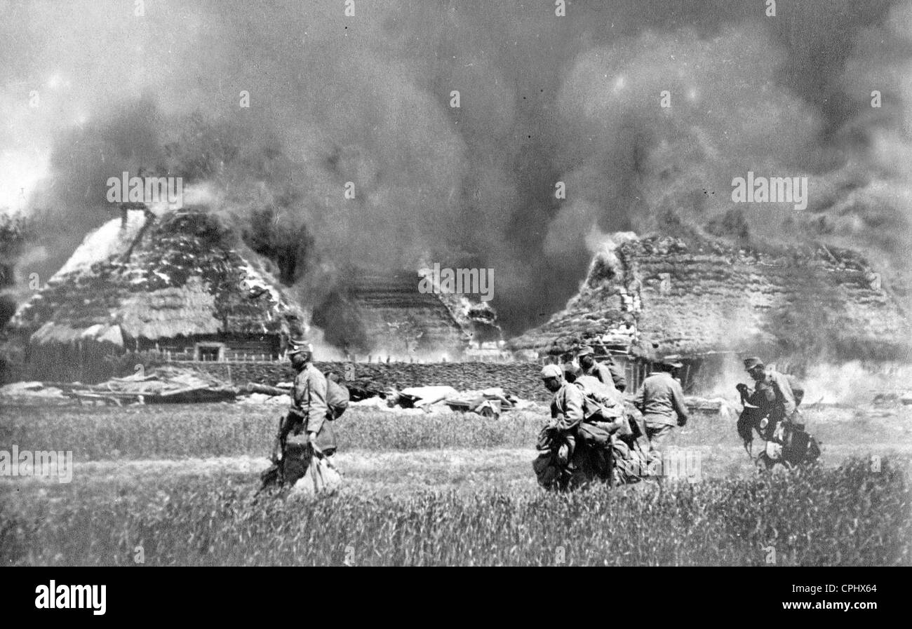 Village burning hi-res stock photography and images - Alamy