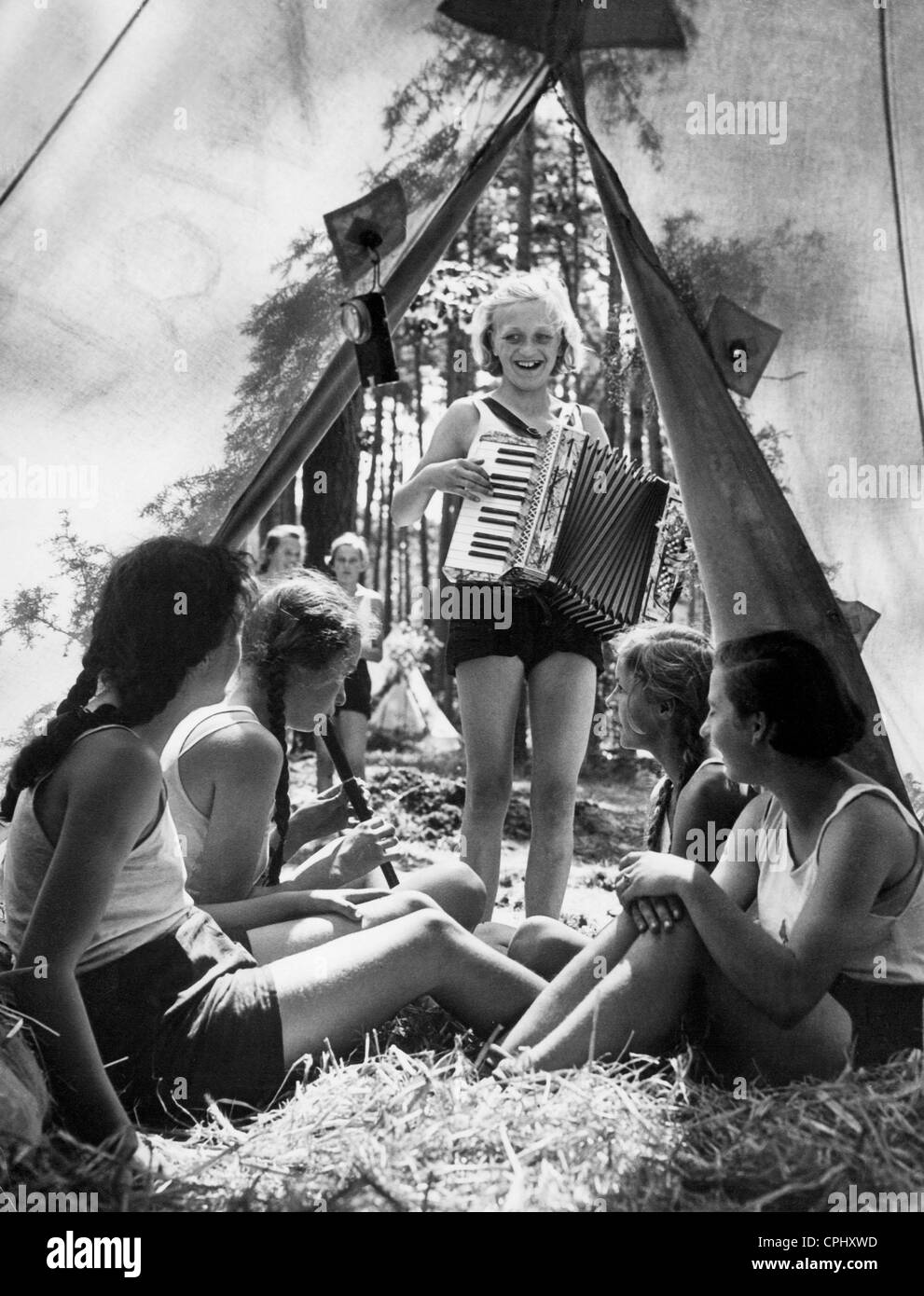 German Jungmaedel (Young Girls) making music in the holiday camp, 1938 ...