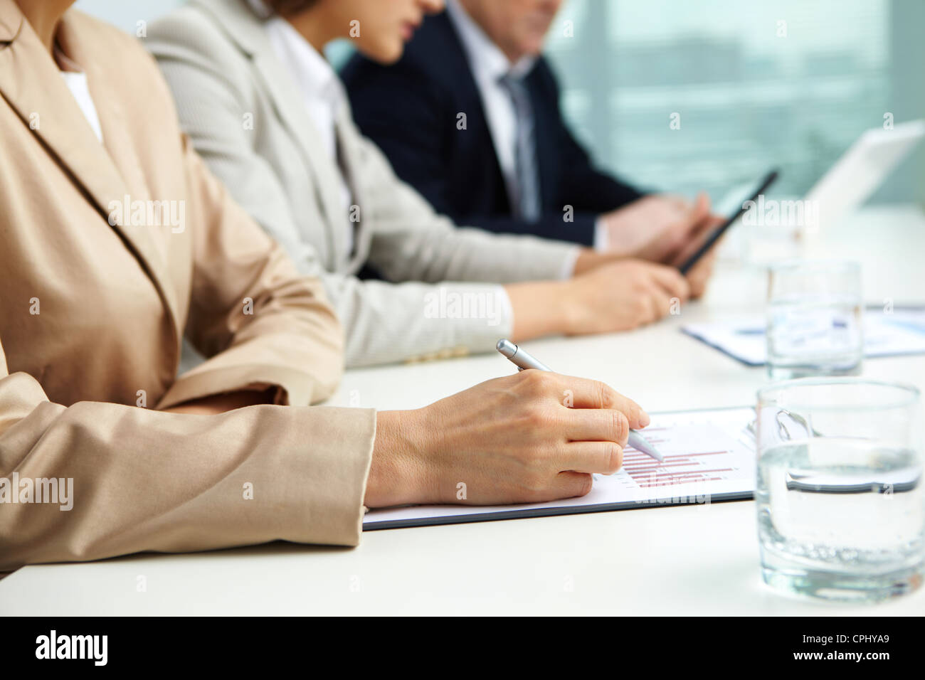 Usual working day at office, business people concentrating on work ...