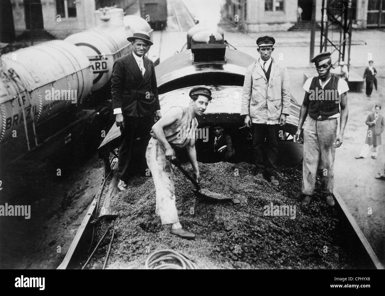 Fireman on a locomotive Stock Photo - Alamy