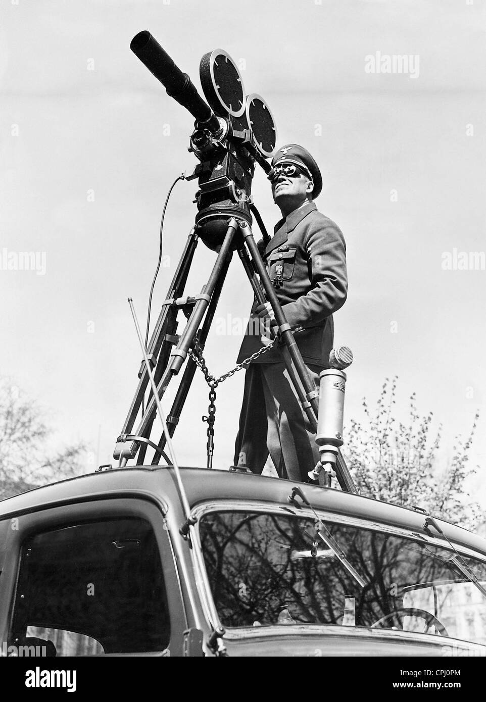 Film reporter of the newsreel on a sound film car, 1941 Stock Photo - Alamy