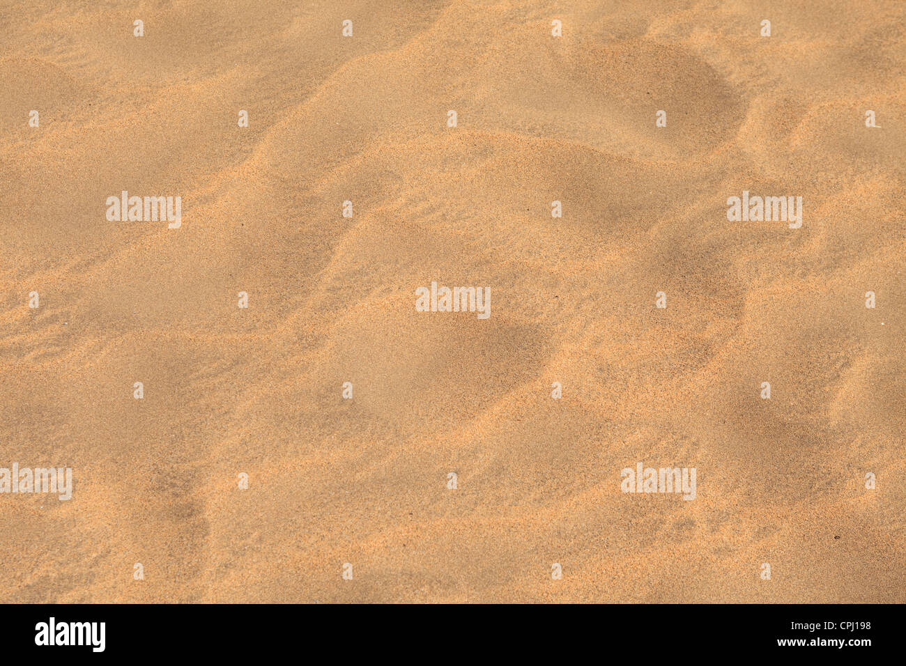 Golden sand in close up Stock Photo - Alamy