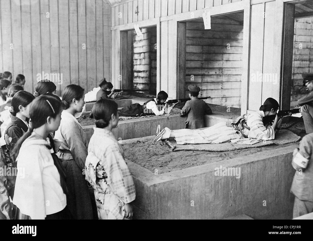 Japanese office workers during target practice, 1934 Stock Photo - Alamy