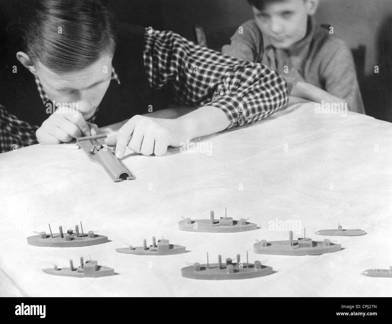 Children are playing Battleships, 1937 Stock Photo - Alamy