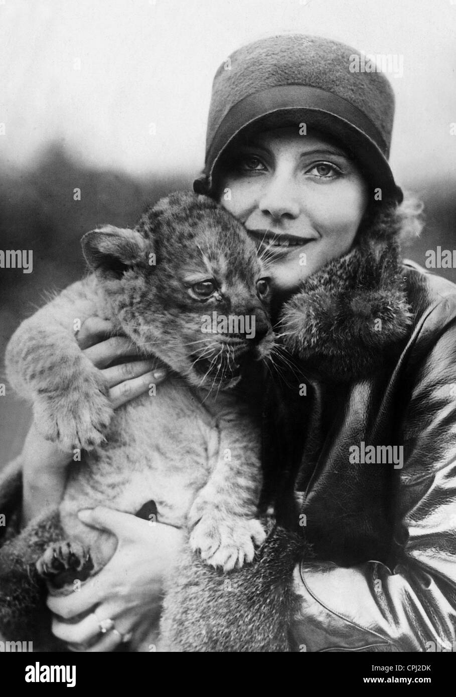 Greta Garbo with a lion cub Stock Photo - Alamy