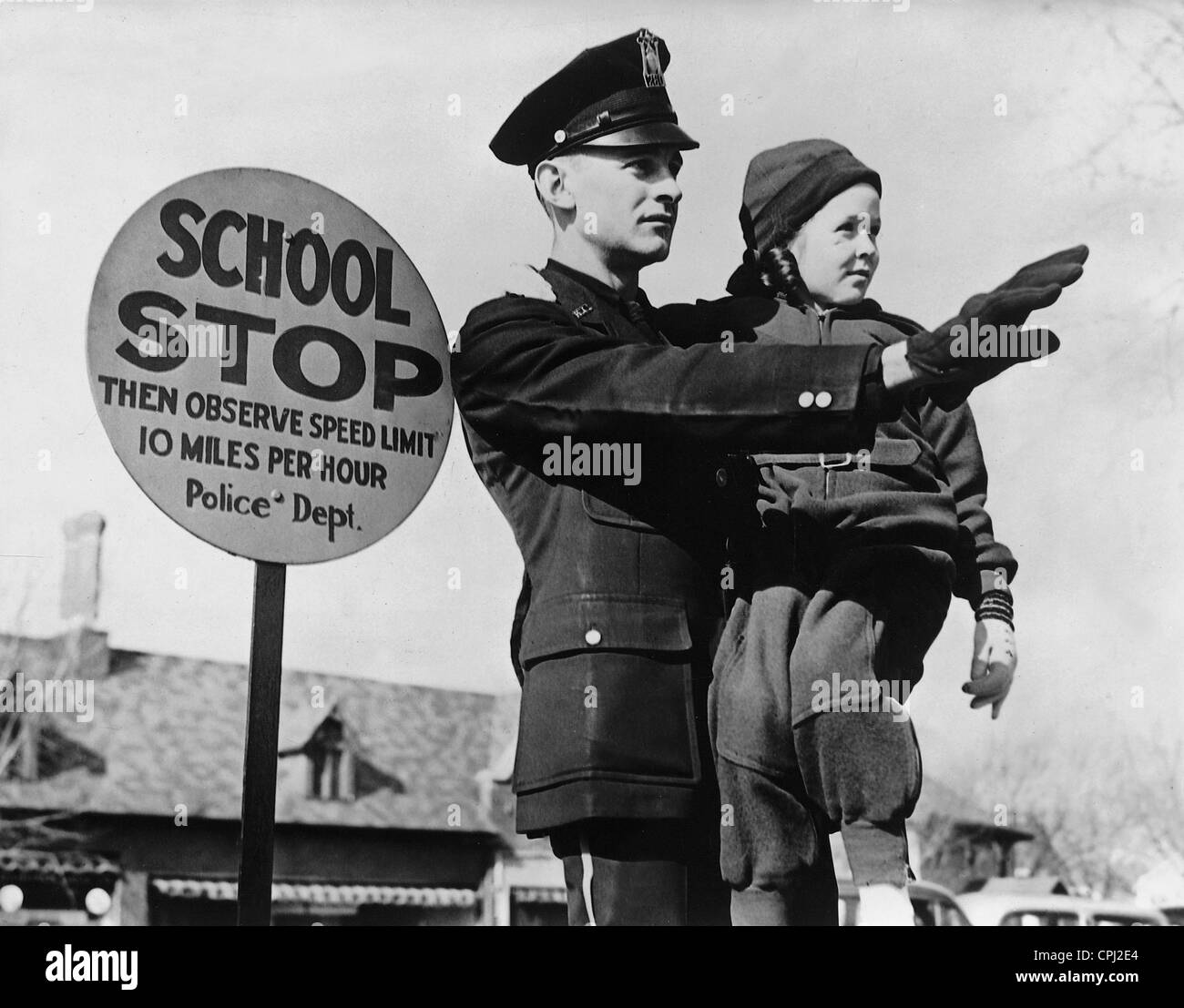 Policeman police car in Black and White Stock Photos & Images - Alamy