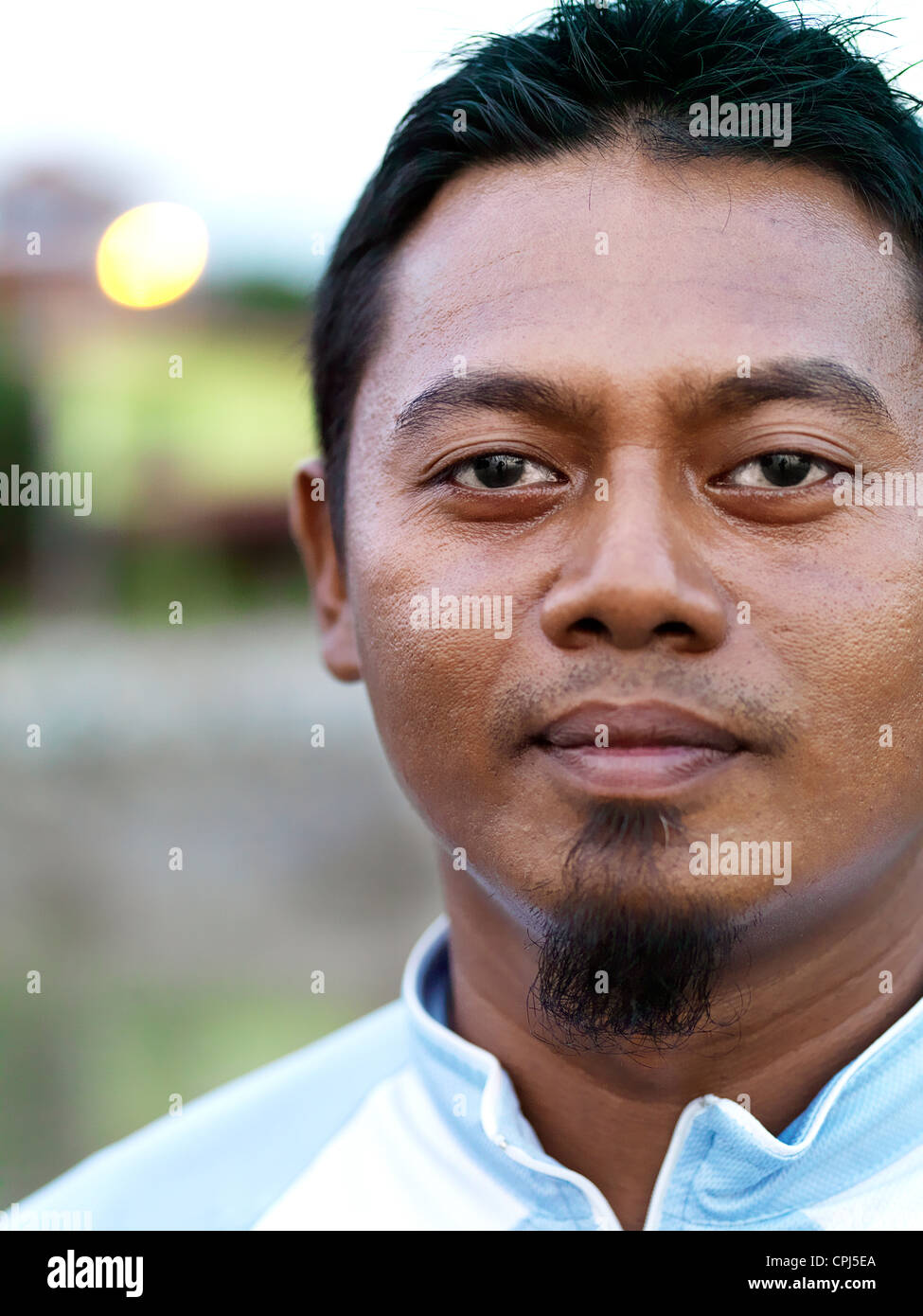 A portrait of a young man with a goatee Stock Photo - Alamy