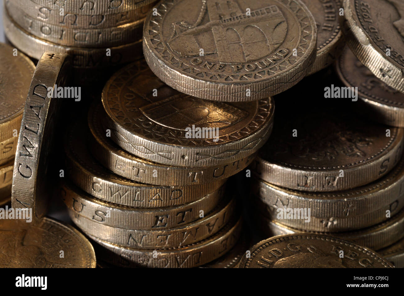 UK one pound coins, pile of one pound coins. pile of money. stack of ...