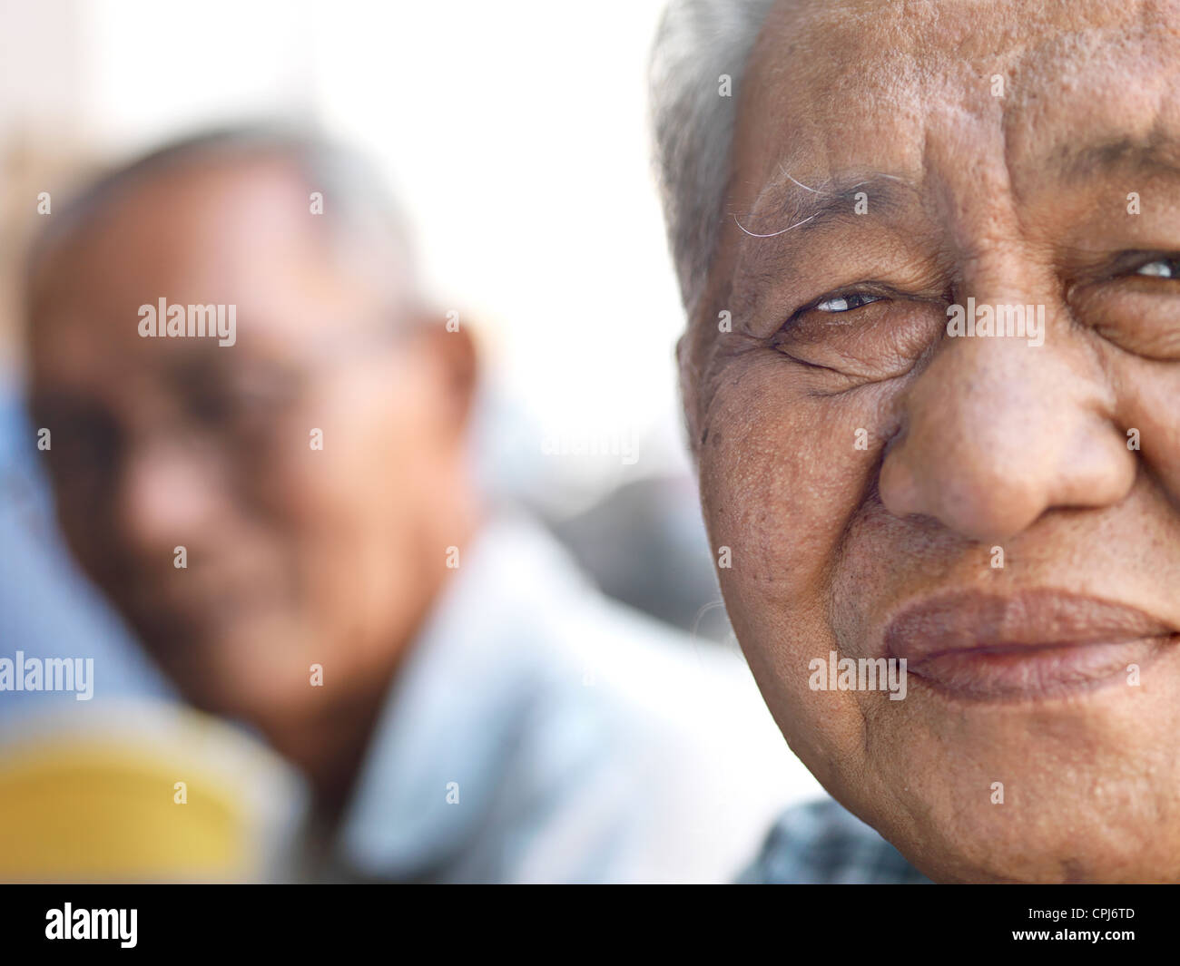 Portrait of an two elder man smiling Stock Photo - Alamy