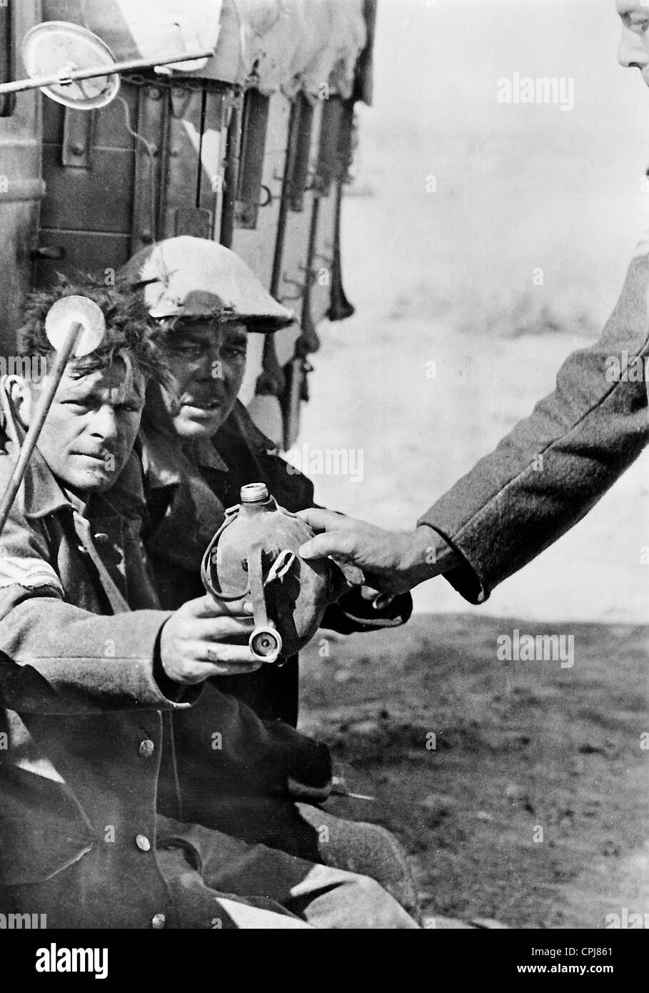 British prisoners of war get their water ration, 1942 Stock Photo - Alamy