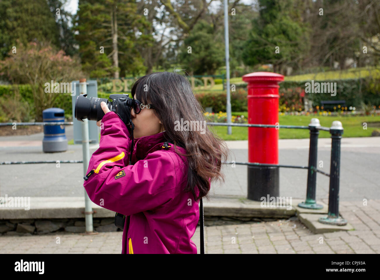 Digital compact camera & photographer taking pictures Stock Photo - Alamy