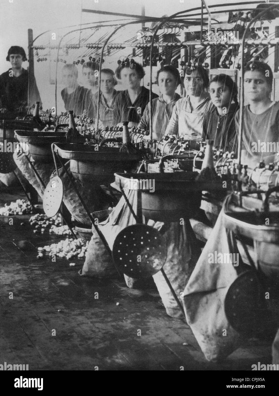 Female workers in a Greek textile factory, 1930 Stock Photo - Alamy