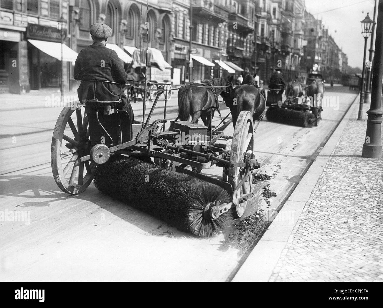 Berlin street sweeper road hi-res stock photography and images - Alamy