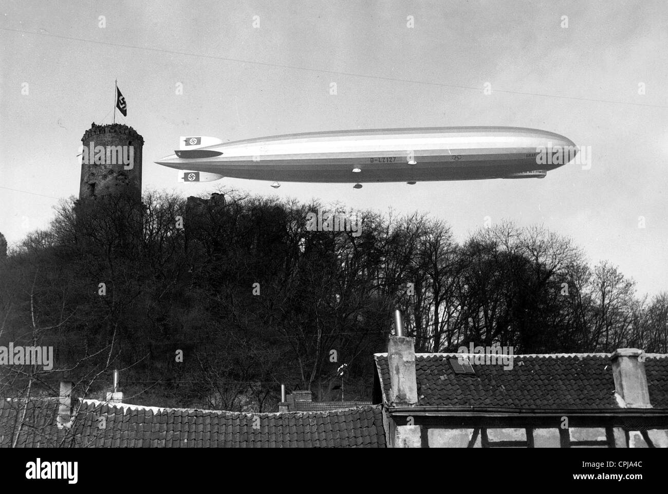 The LZ 127 'Hindenburg' over the Godesburg castle, 1936 Stock Photo - Alamy