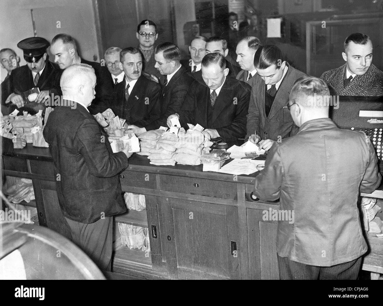 Money cash in bank Black and White Stock Photos & Images - Alamy