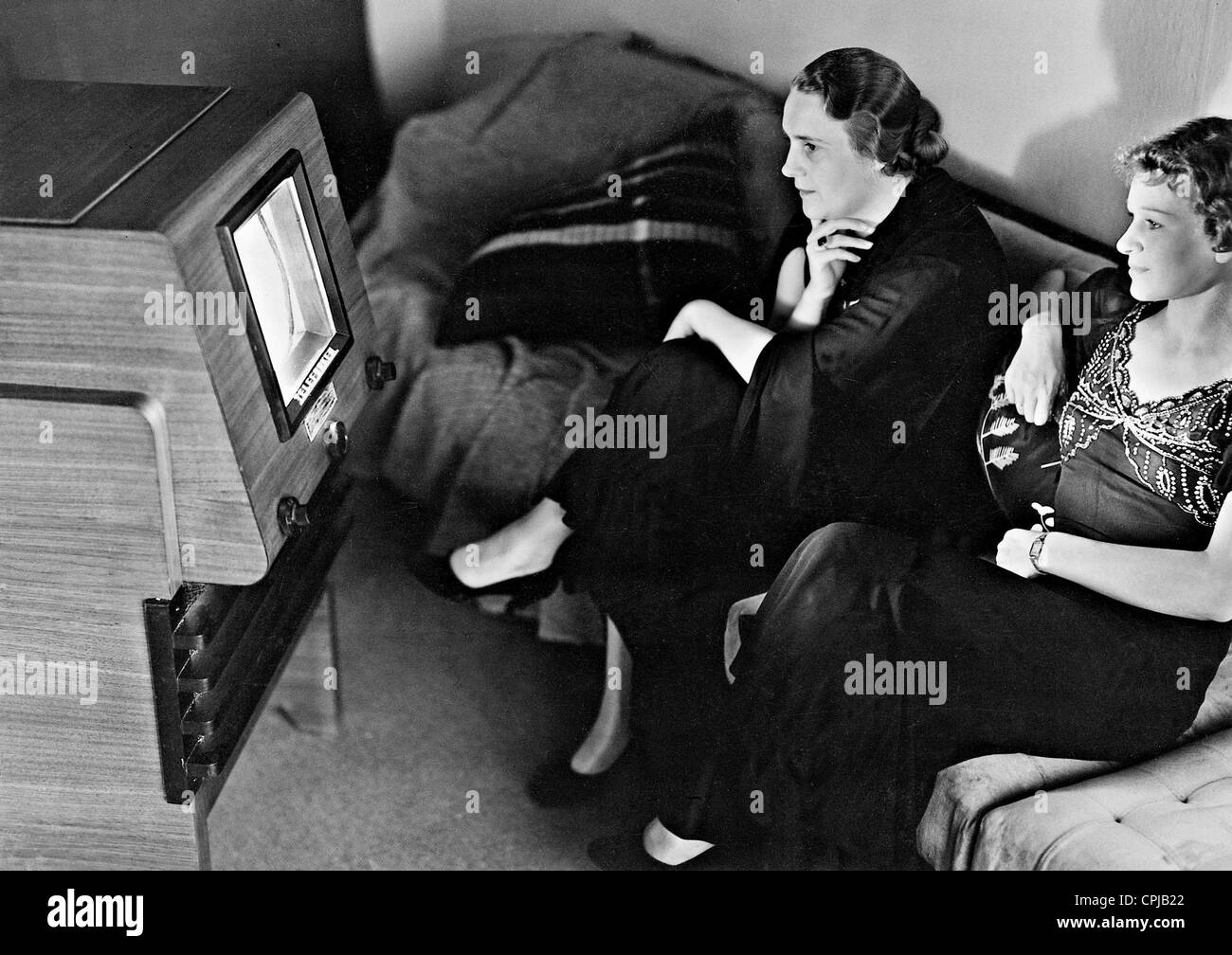 Watching the entertainment Black and White Stock Photos & Images - Alamy