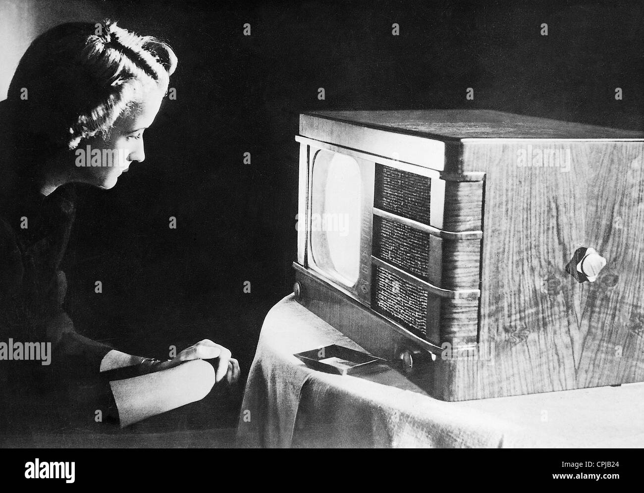 Woman watching television, 1938 Stock Photo - Alamy