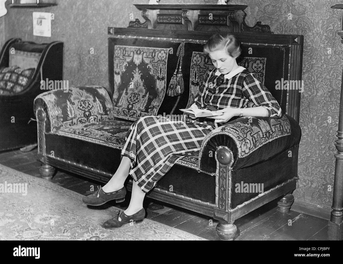 Woman reading, 1937 Stock Photo - Alamy