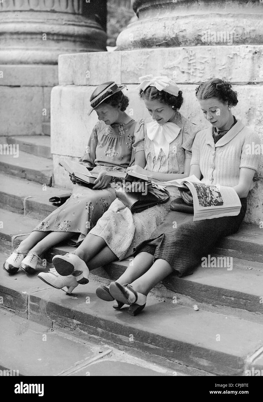 Women in London reading, 1937 Stock Photo - Alamy