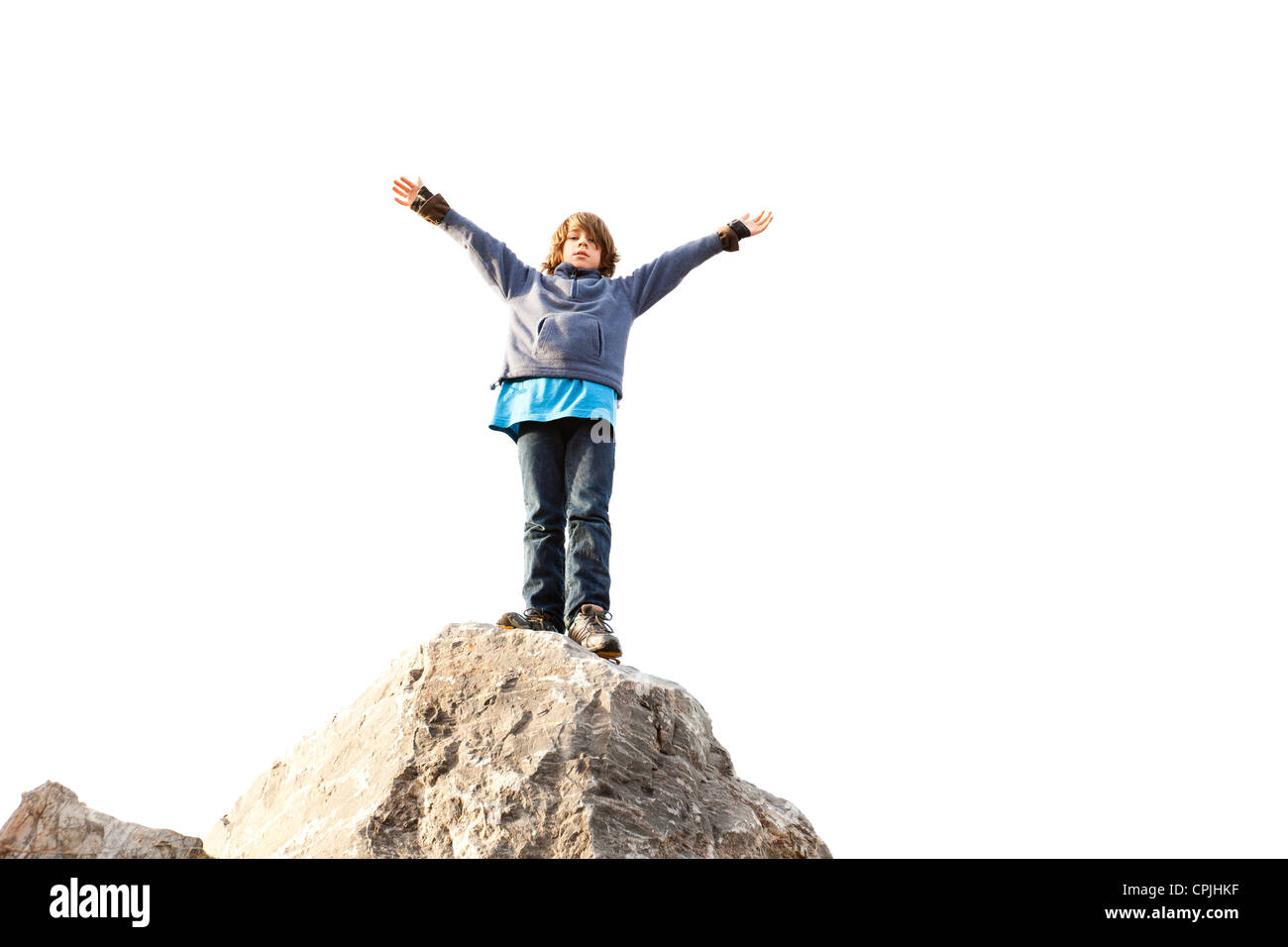 Boy playing in rocks hi-res stock photography and images - Alamy