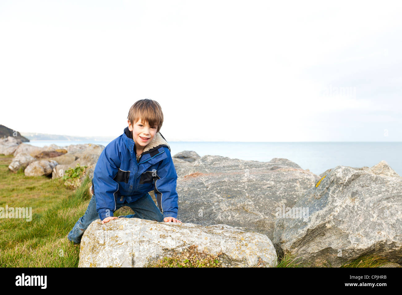 Boy Leaning On Rocks High Resolution Stock Photography and Images - Alamy