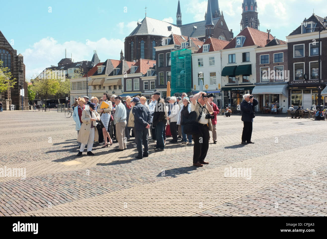 Crowd of Tourists in Delft town centre square Stock Photo - Alamy