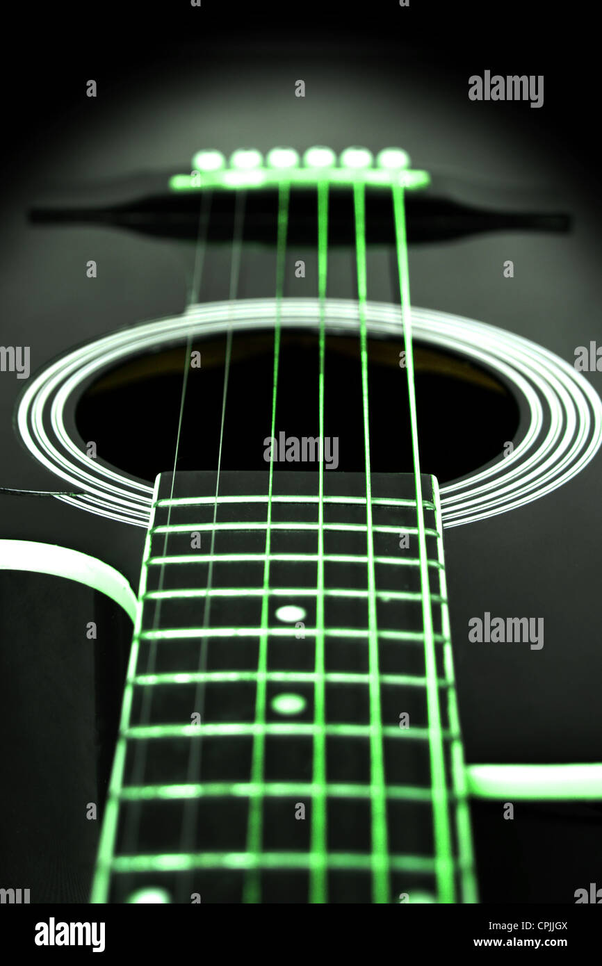 Green guitar strings - lighting effect at night Stock Photo - Alamy