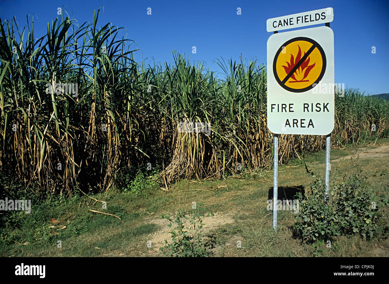 Sign warning of high fire risk area around sugar cane fields, Cairns ...
