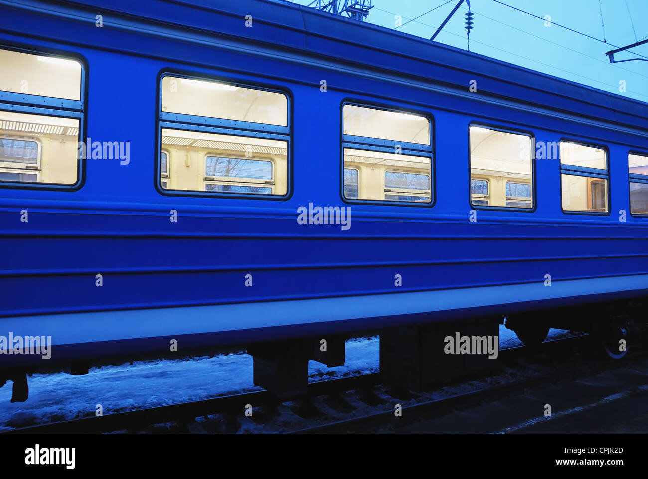 railroad blue carriage by night in winter Stock Photo - Alamy
