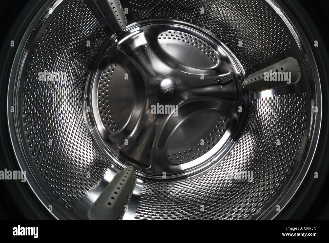 metallic barrel of laundry washer inside horizontal Stock Photo - Alamy