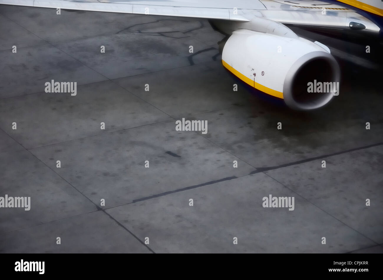 aircraft wing with an engine. Just after docking on airport Stock Photo ...