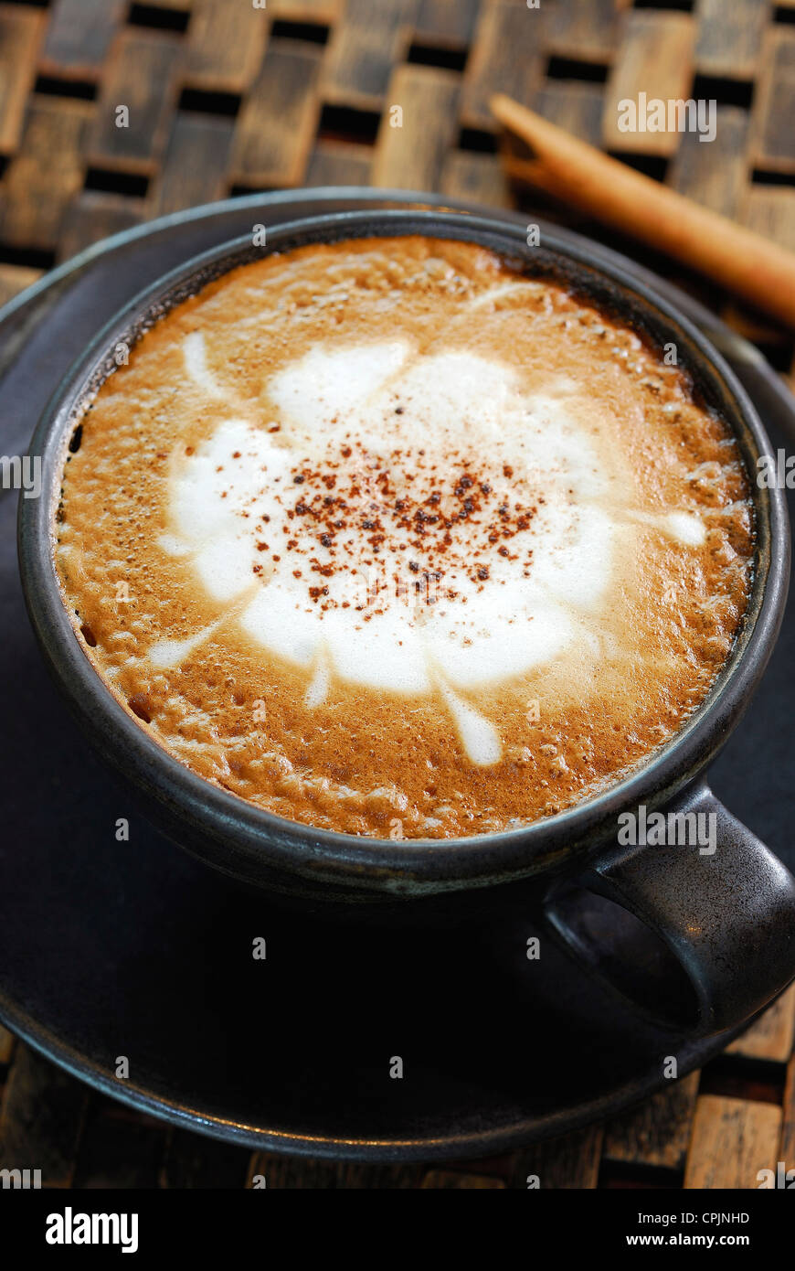 Cafe Latte Foam Art with cinnamon Stock Photo - Alamy