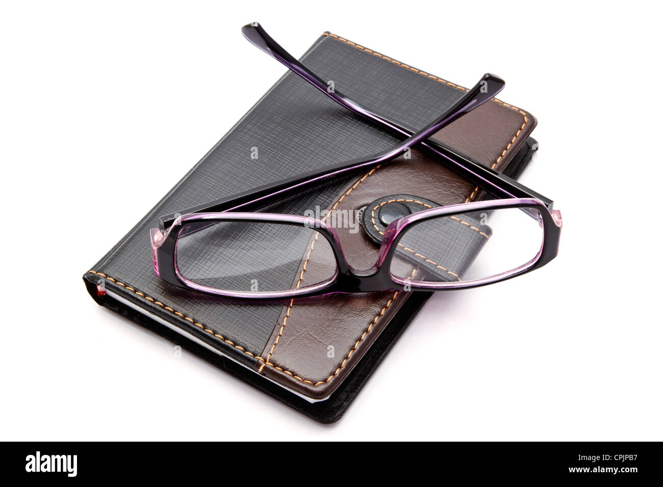 notebook and glasses isolated on white background Stock Photo - Alamy