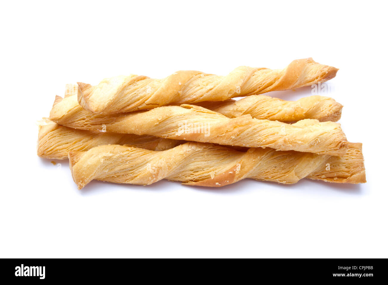 Butter salted twists closeup on white background Stock Photo - Alamy