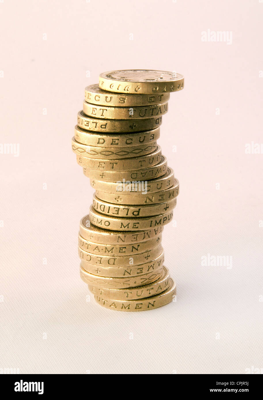 Stack of pound coins on white background Stock Photo - Alamy