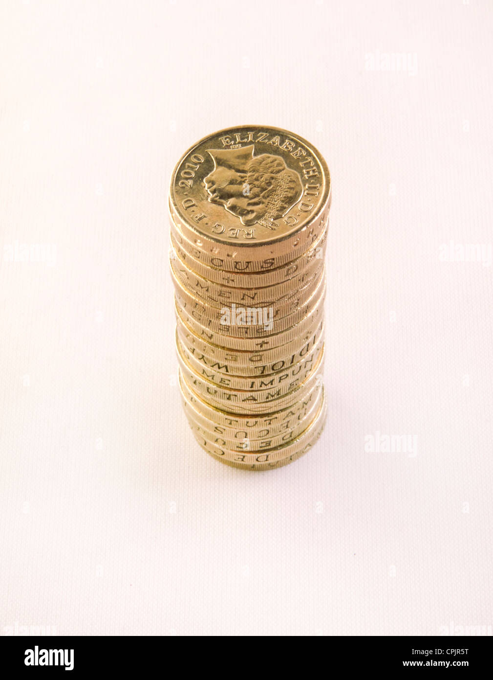 Stack of pound coins on white background Stock Photo - Alamy