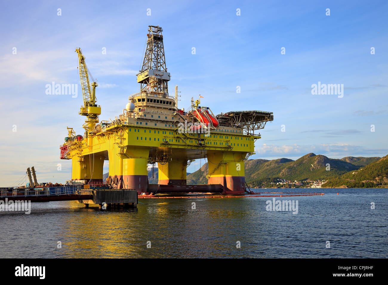 Oil rig near the mountains in Norway Stock Photo - Alamy