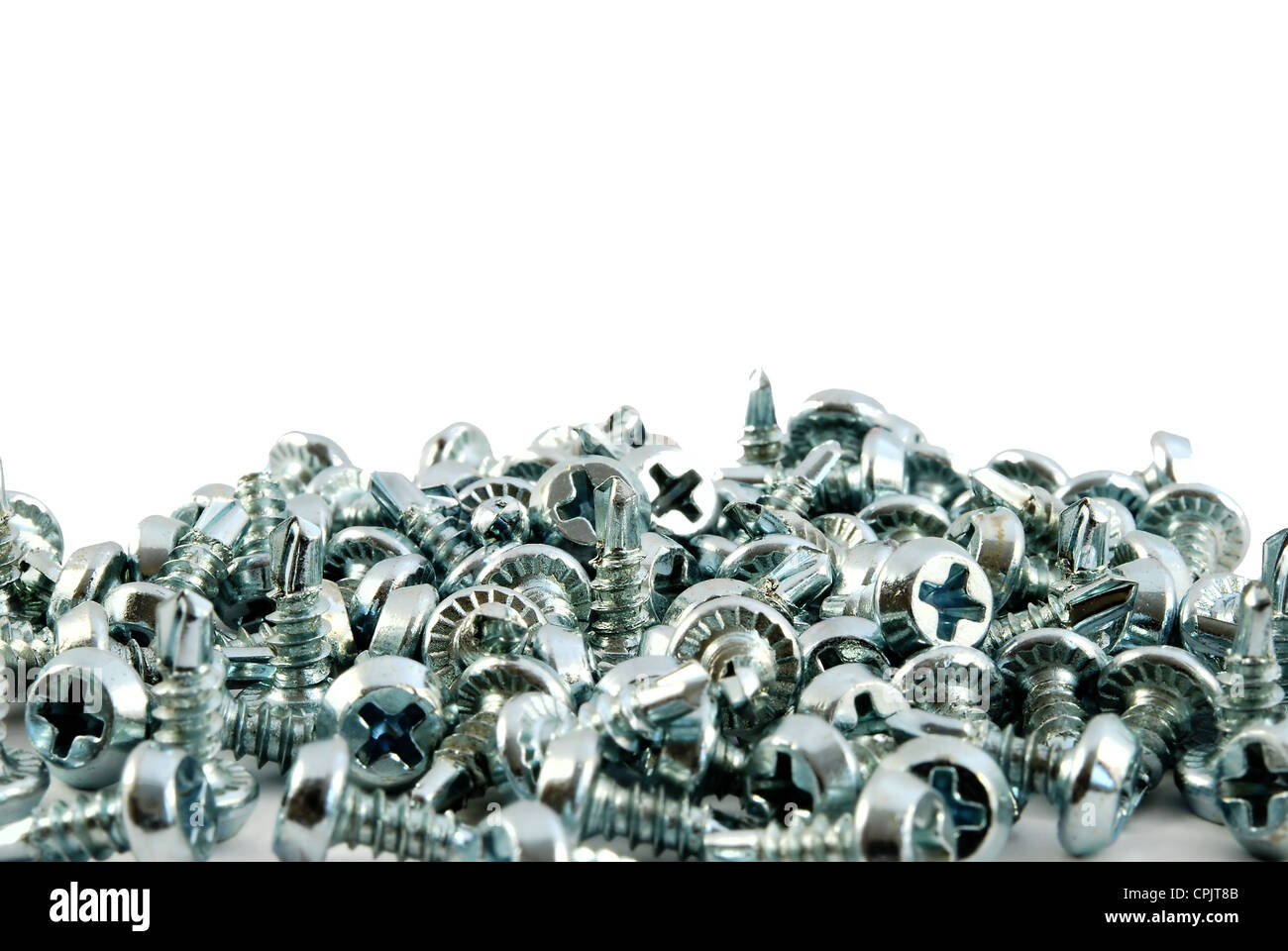 A lot of steel screws with copy paste for your text Stock Photo - Alamy