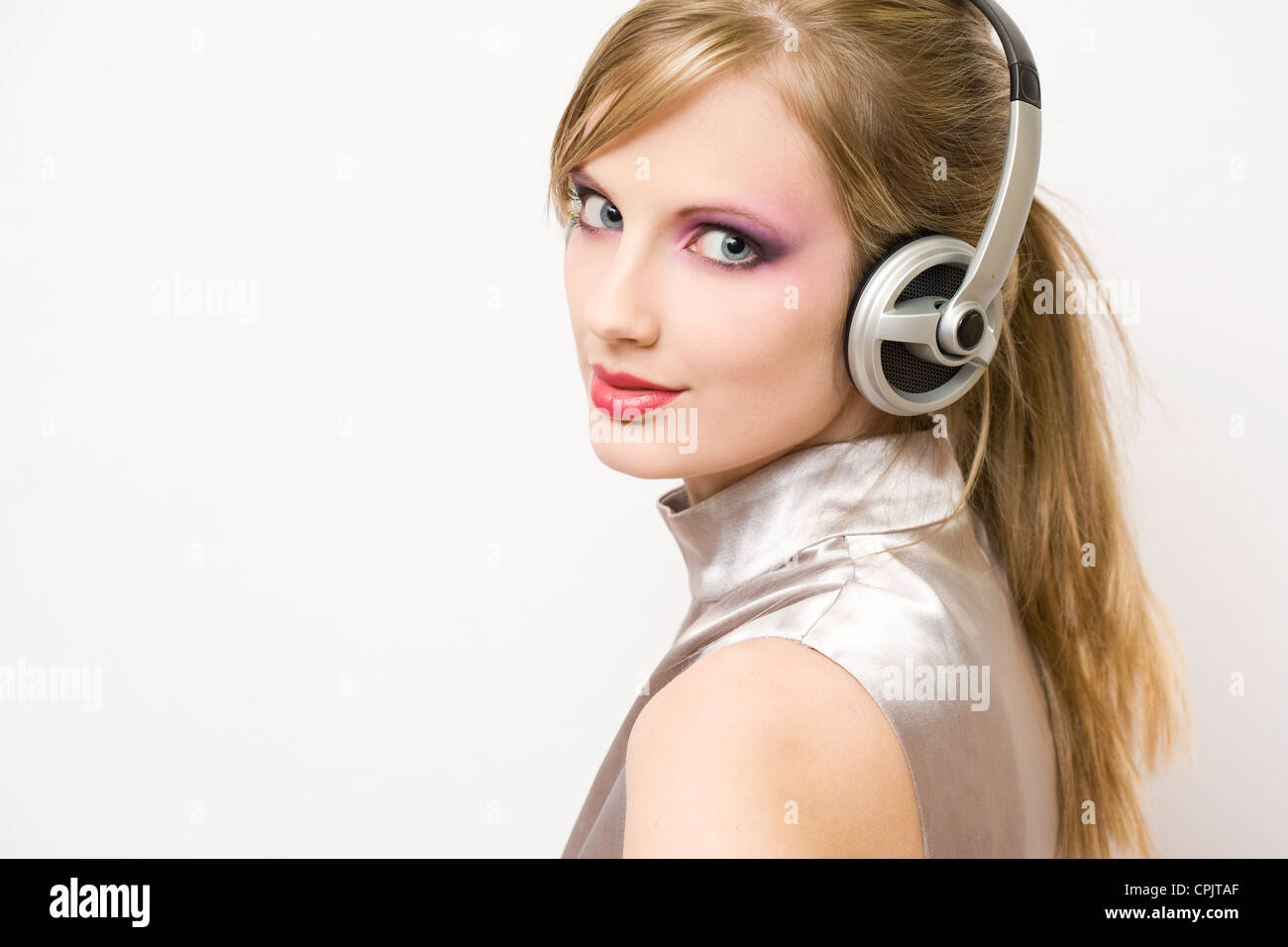 Silver pop girl, beautiful young blond girl with colorful makeup ...